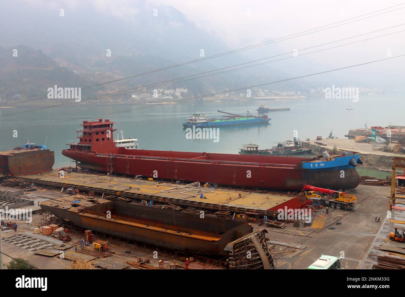 Aerial photo shows workers are busy working at a shipbuilding base in ...