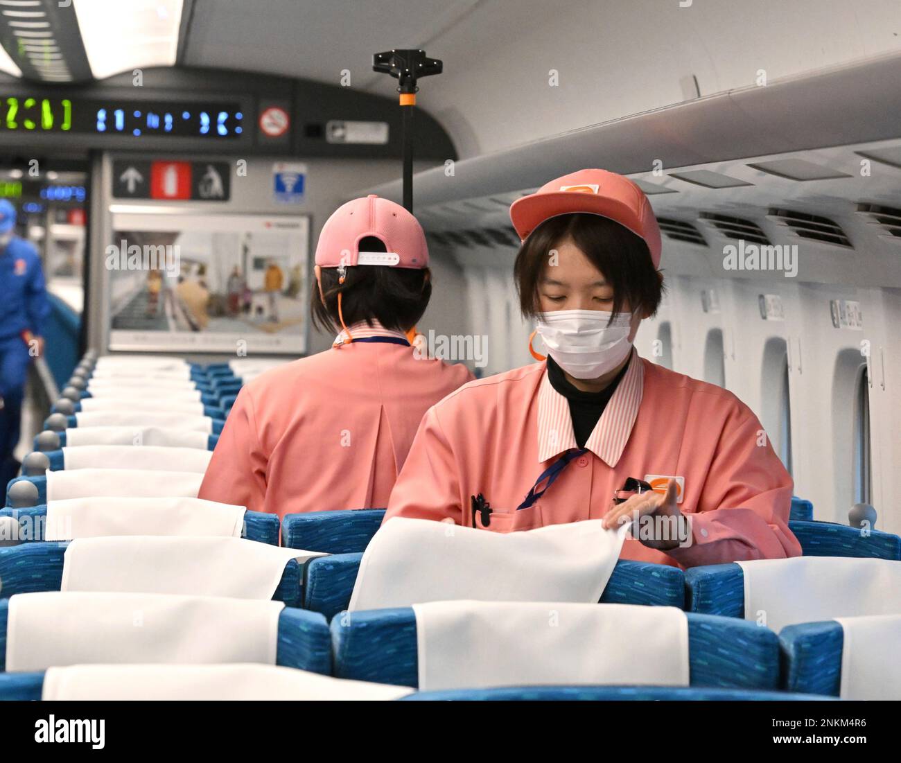 The staffs clean the Shinkansen (Bullet train) during stopping at Tokyo ...