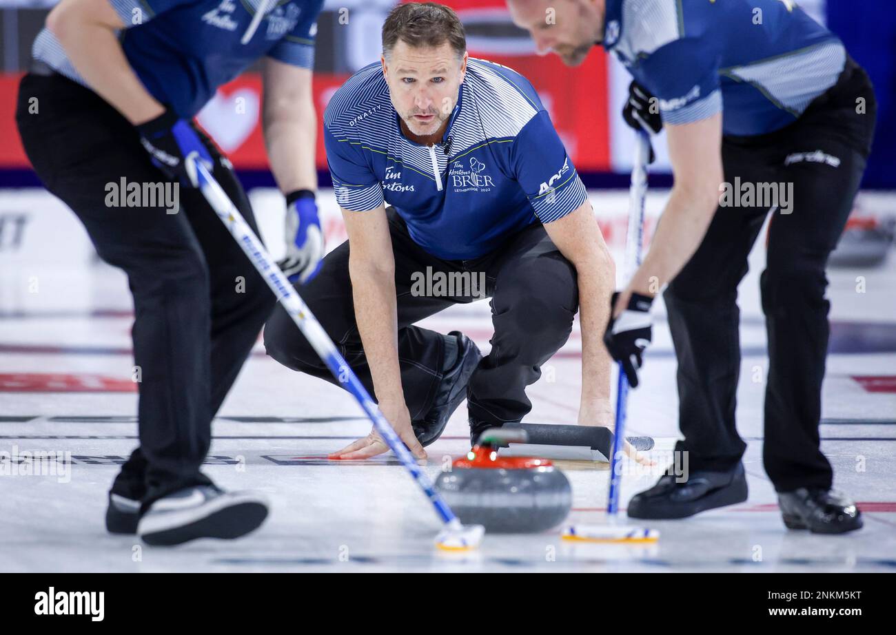 Team Nova Scotia skip Paul Flemming makes a shot while playing against ...