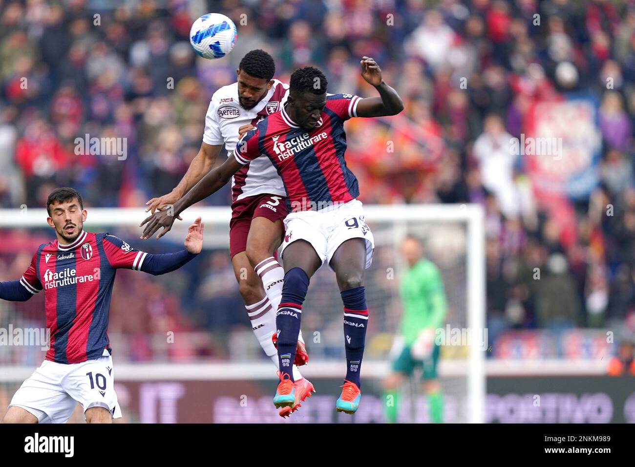 Torino's Bremer and Bologna's Musa Barrow, right, vie for the ball ...