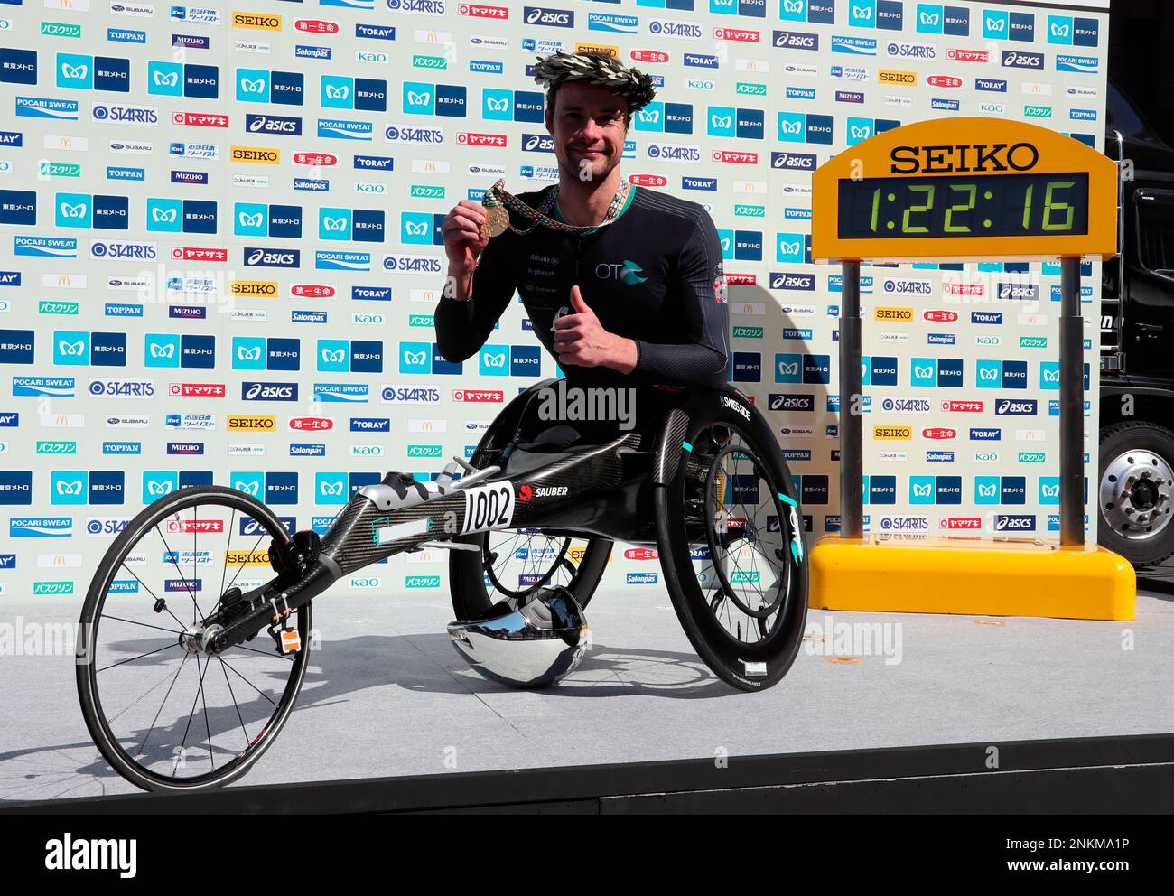 Marcel Eric Hug of Switzerland poses for a photo after winning the ...