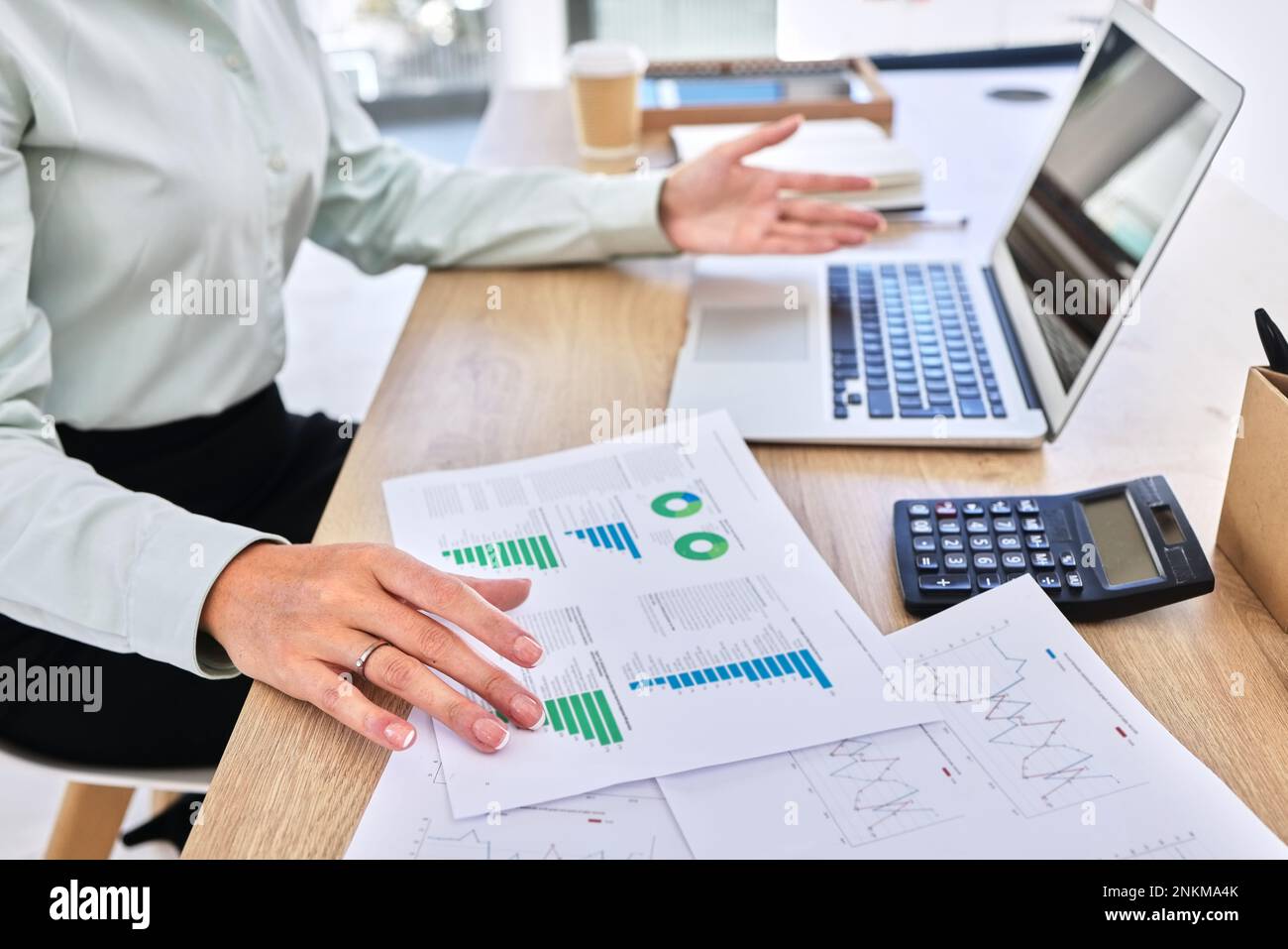 Business infographic, graph and hands with laptop on desk for planning ...