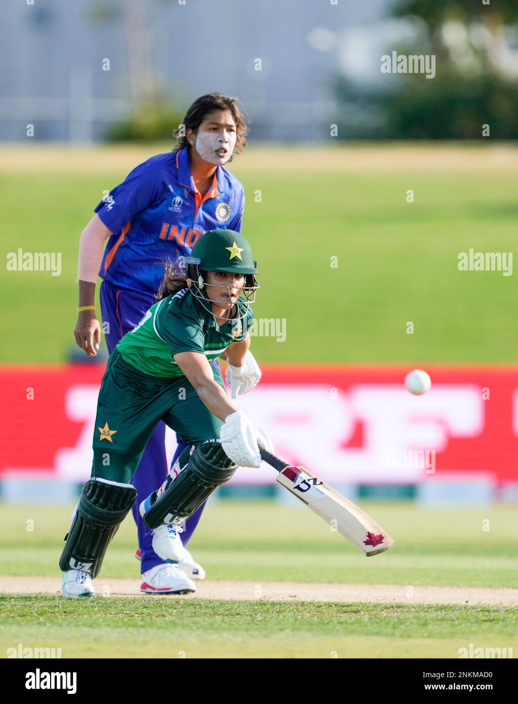 Sidra Amin of Pakistan runs watched by Jhulan Goswami of India during ...