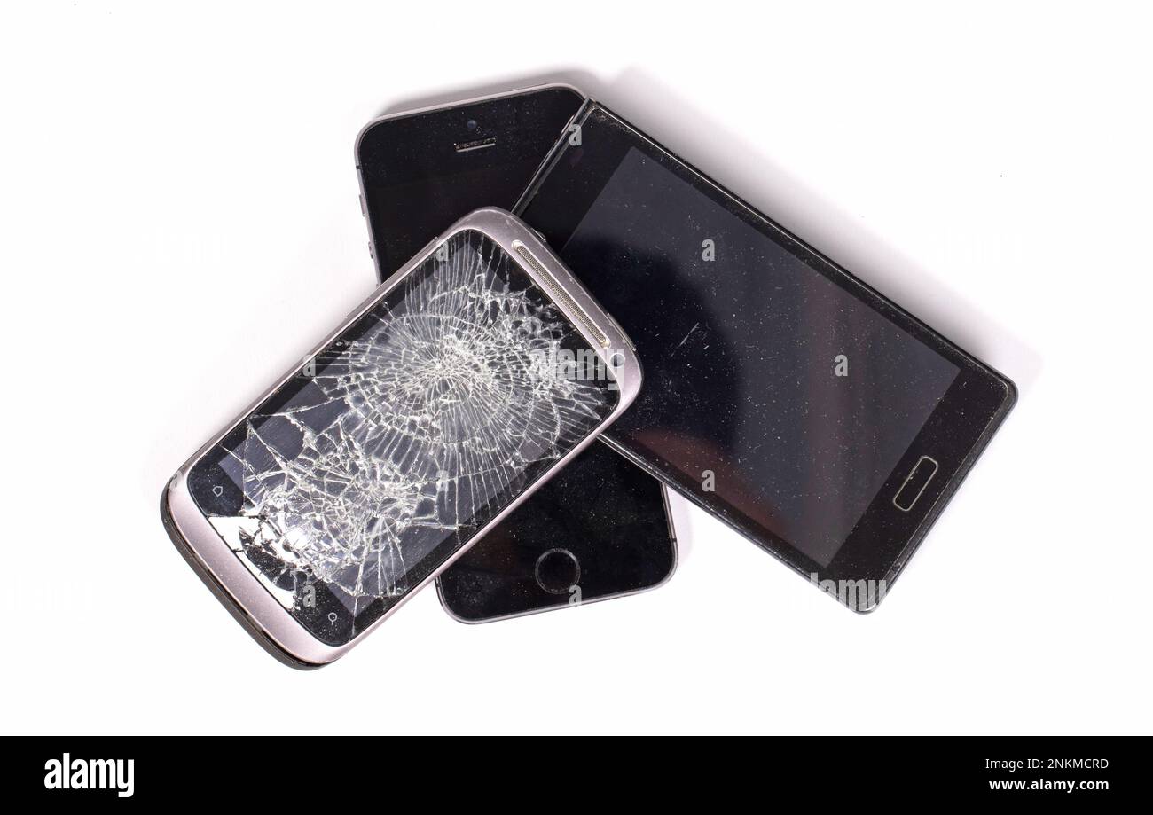 Broken display screen smartphone (stack) on a white background Stock ...