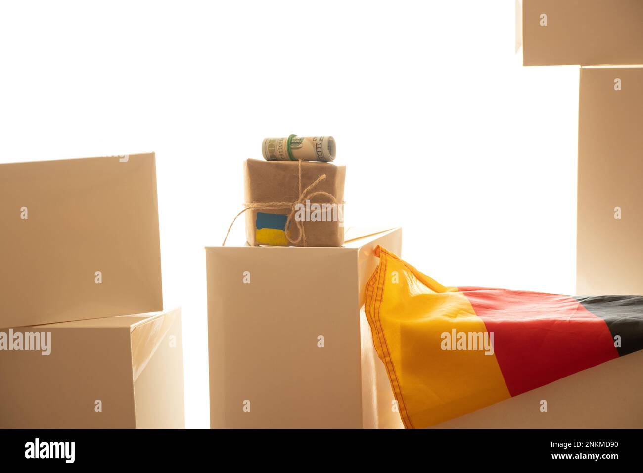 Boxes with humanitarian aid for Ukraine and the flag of Germany and ...