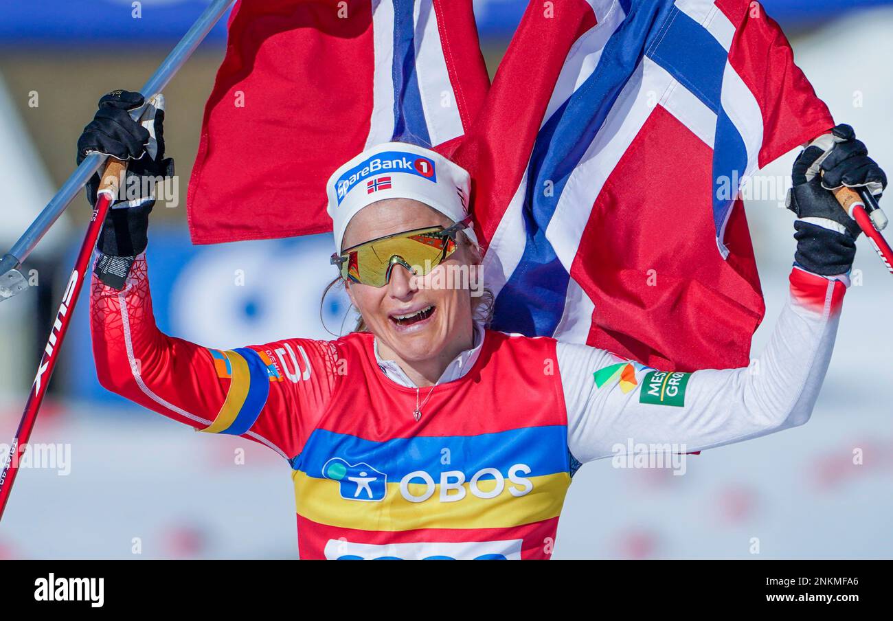 Norway's Therese Johaug celebrates winning the women's 30km mass start ...
