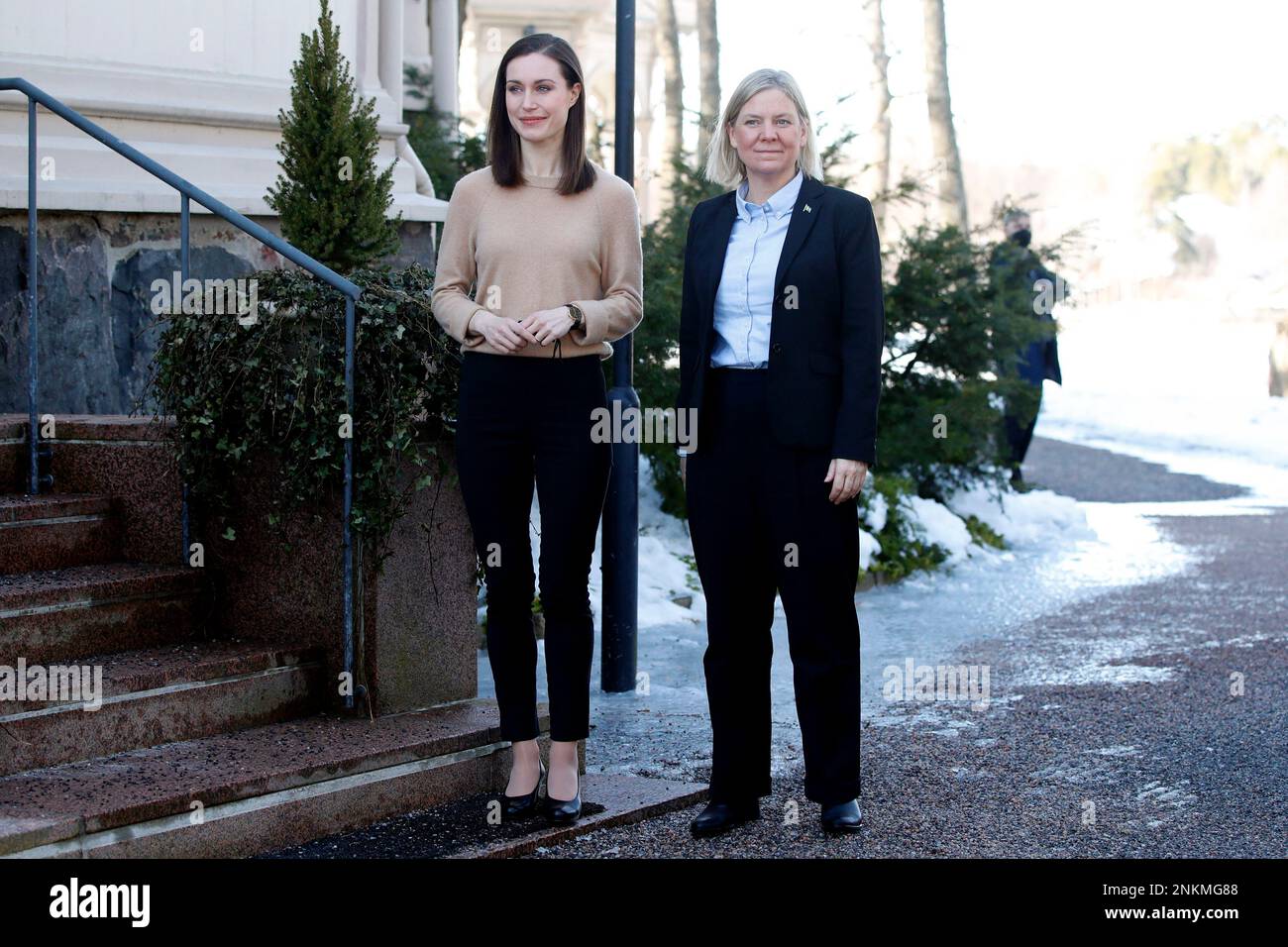 Finnish Prime Minister Sanna Marin, left, welcomes her Swedish ...
