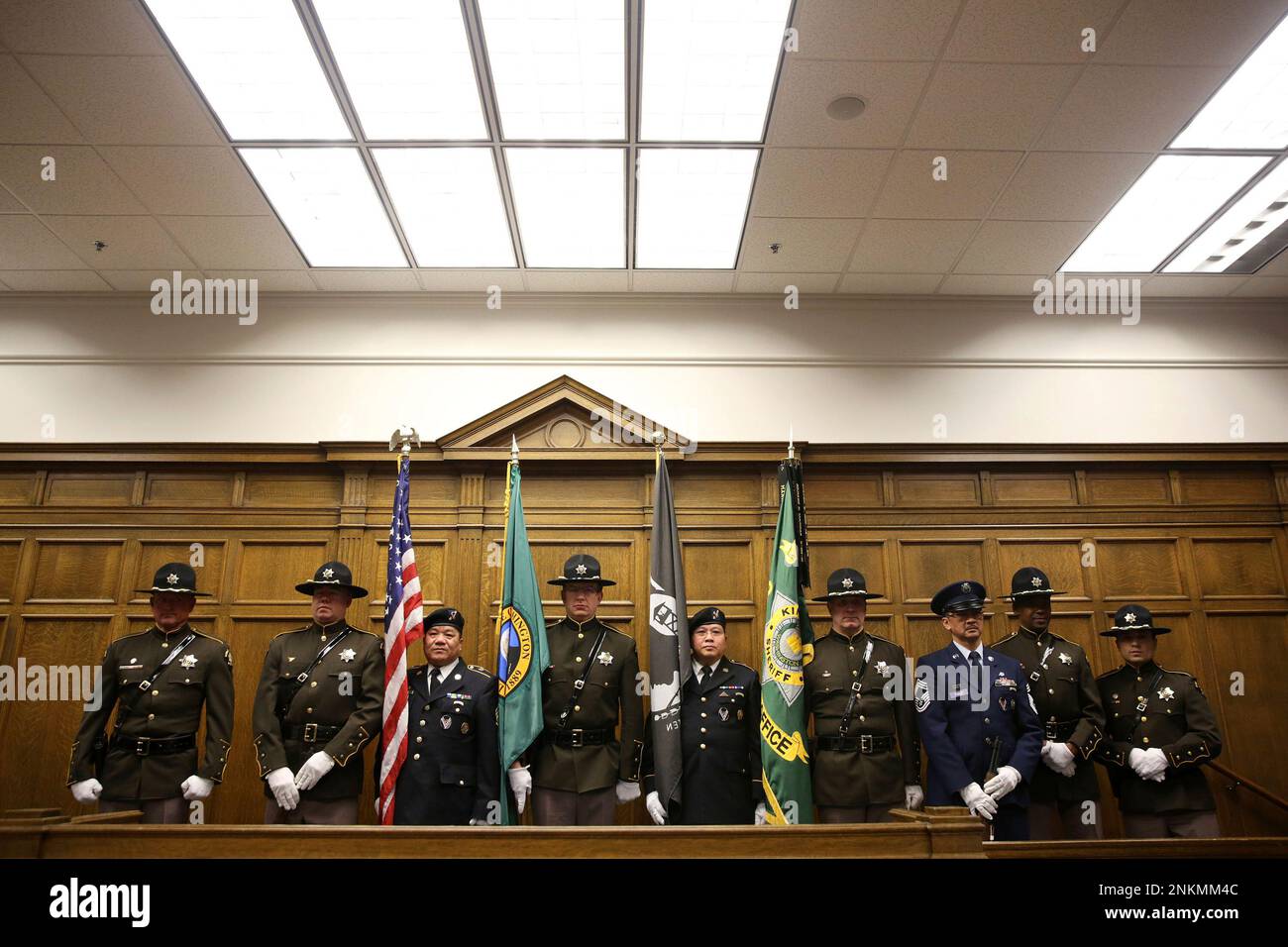 The King County Sheriff's Department color guard stands at attention ...