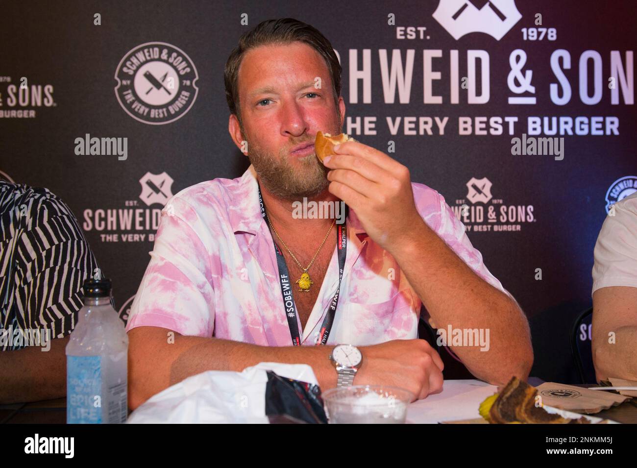 Dave Portnoy eats a hamburger at Burger Bash during the South Beach ...