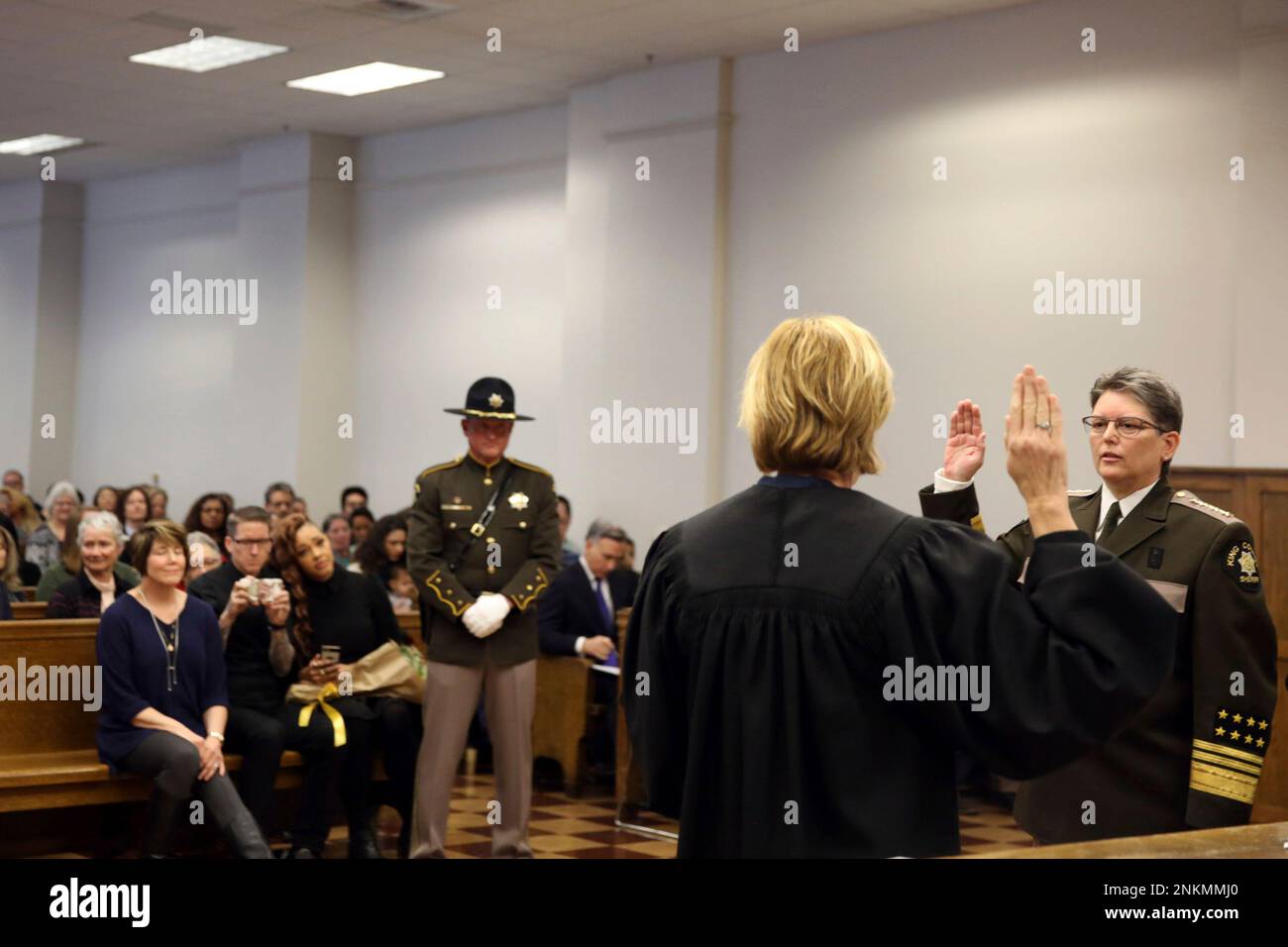 Mitzi Johanknect is sworn in as King County Sheriff by Judge Laura ...