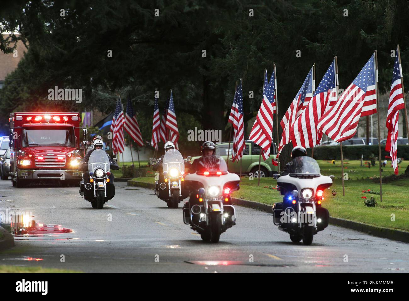 A procession of law enforcement officers escort the body of Pierce ...