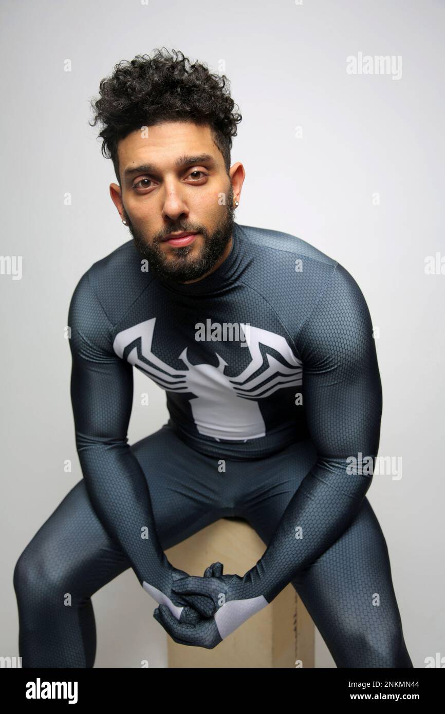 Jay Velasquez, of Seattle, poses for a portrait as black suit Spiderman ...