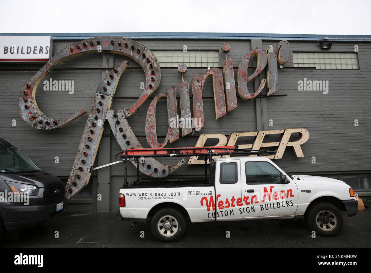 An original Rainier Beer sign hangs on an exterior wall of the Western ...