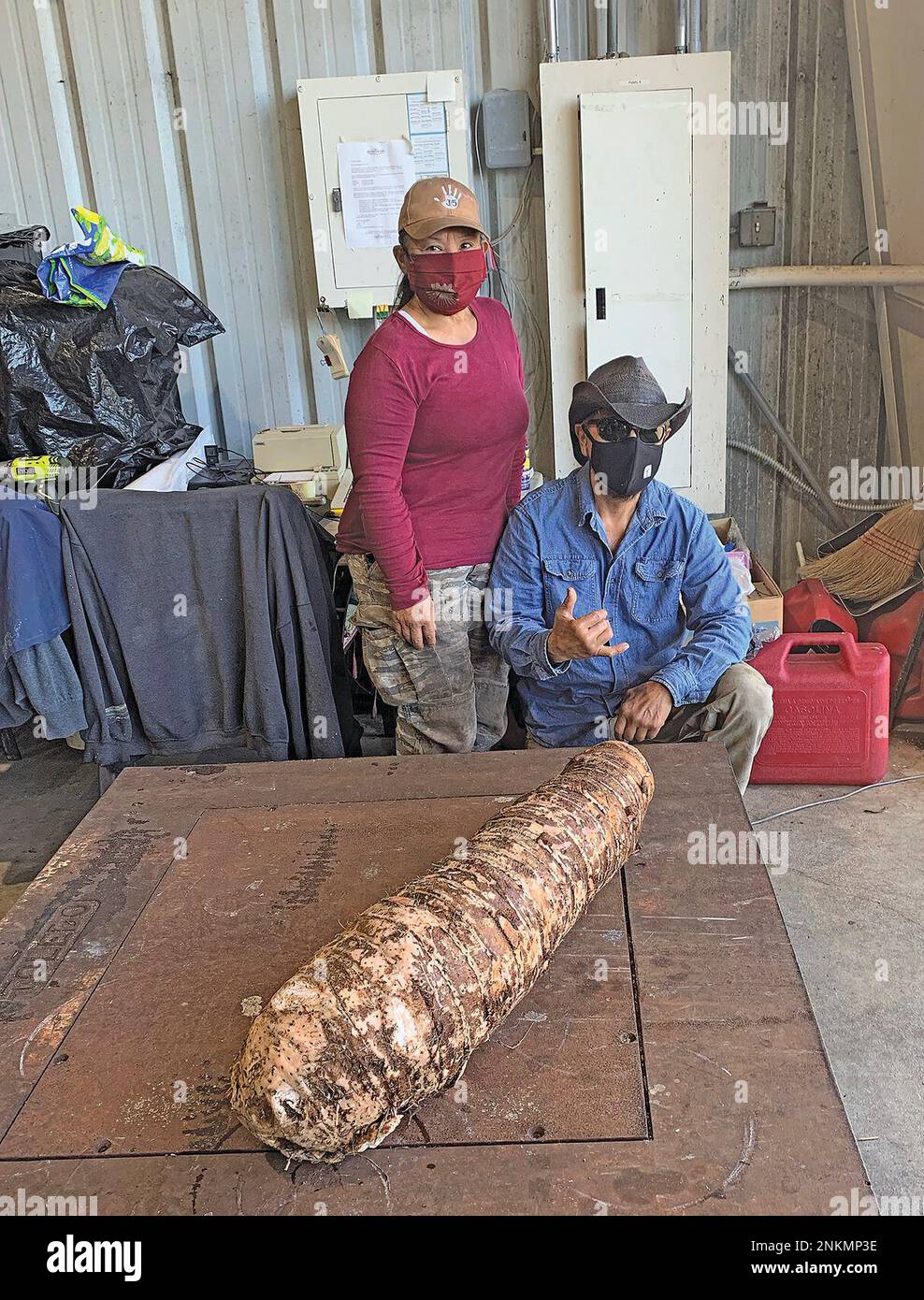 In this February, 2022 photo, Nellie and Clarence Medeiros pose with a ...