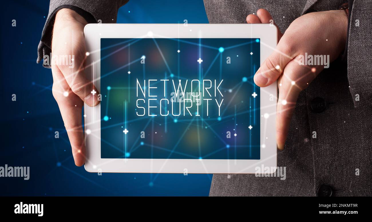 Person holding tablet, security concept Stock Photo - Alamy