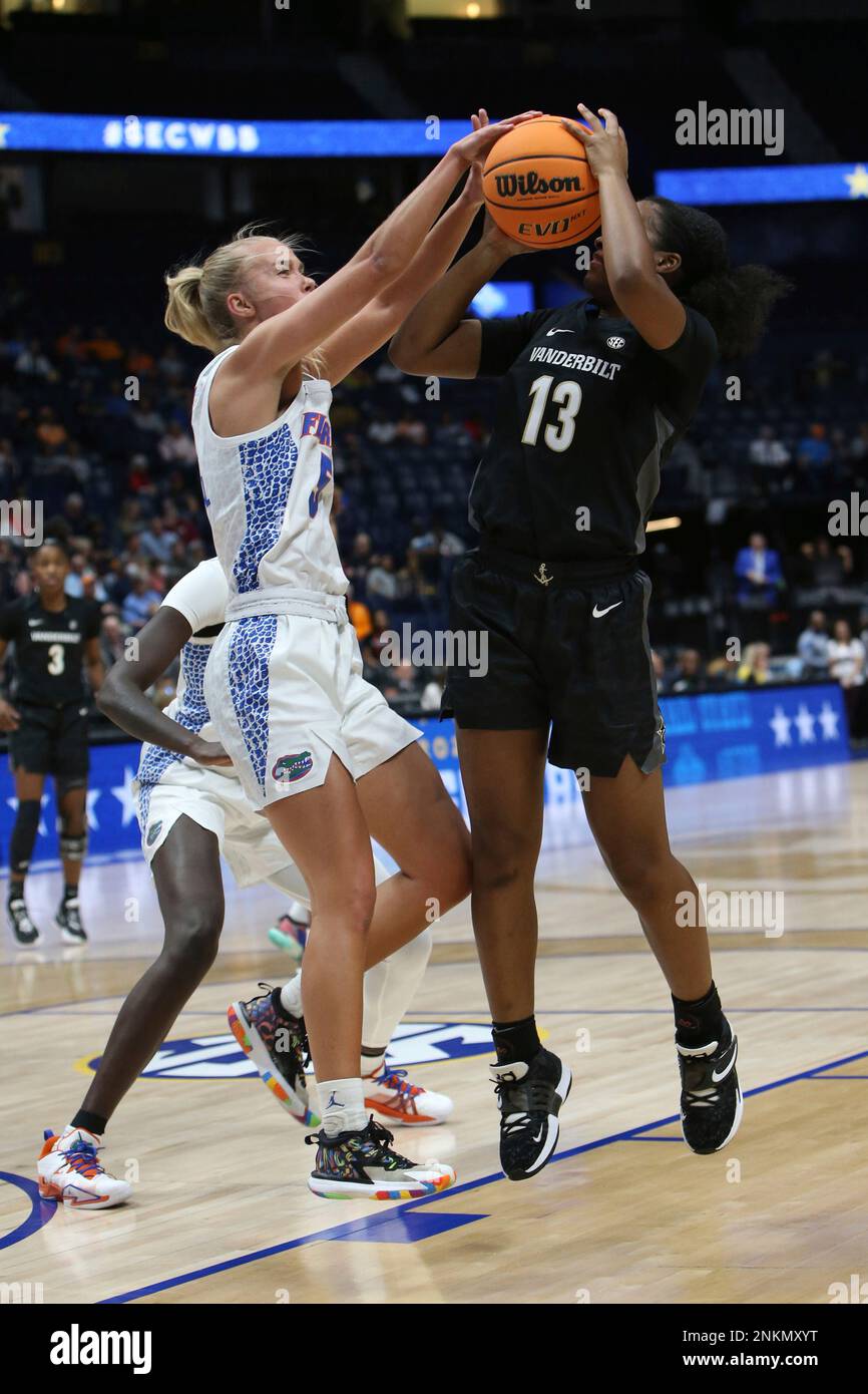 NASHVILLE, TN - MARCH 03: Florida Gators guard Alberte Rimdal (5) deflects the shot of ...