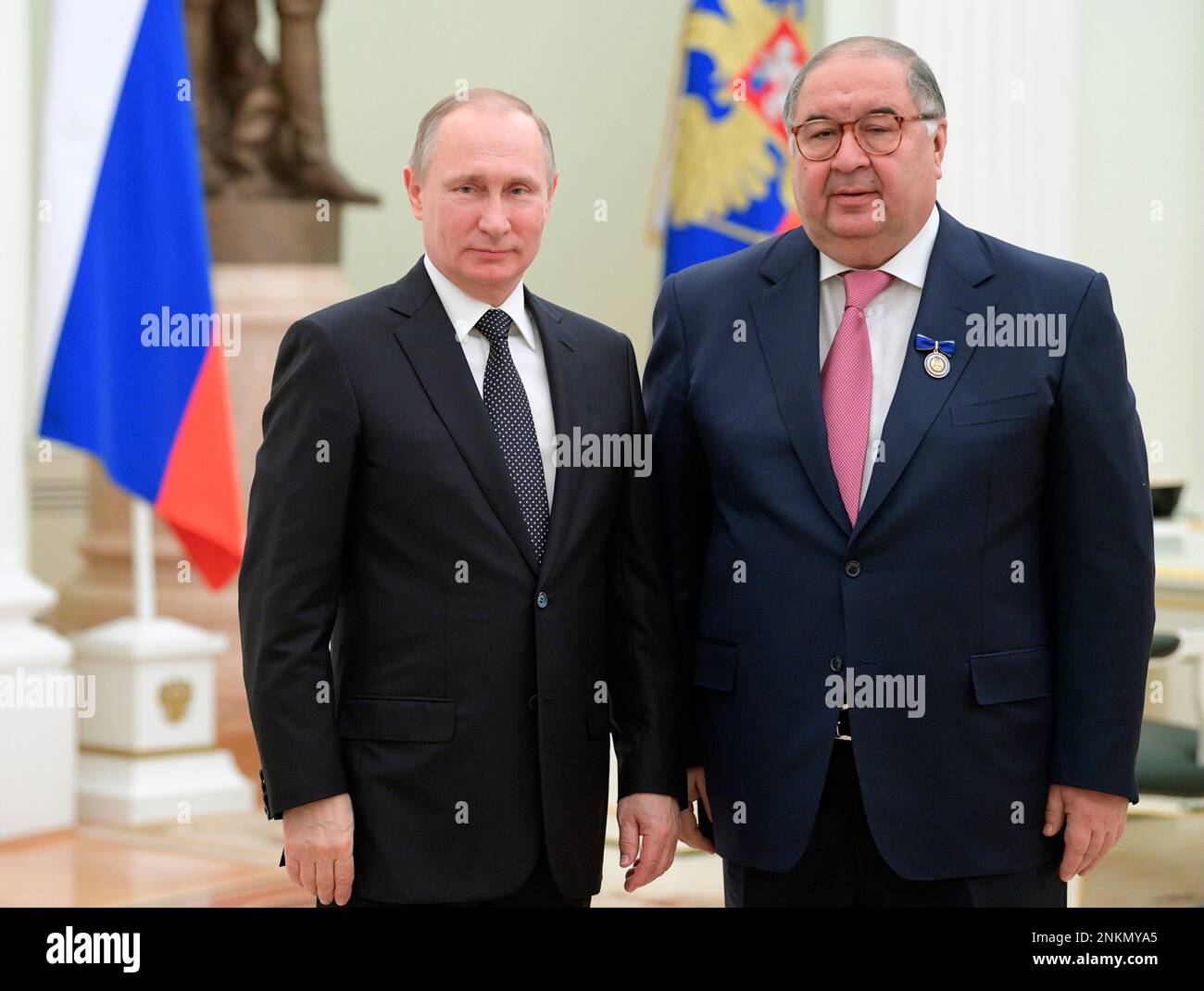 FILE - Russian President Vladimir Putin, left, poses for a photo with ...