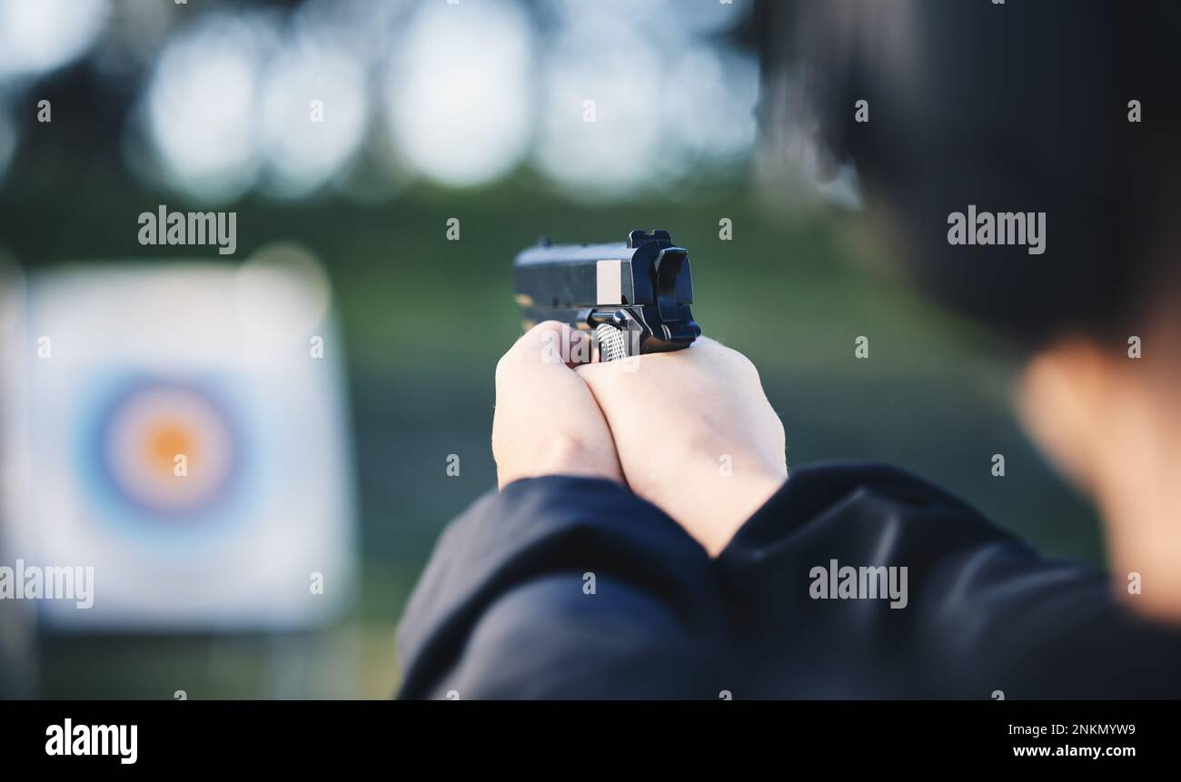 Hands, gun and aim at shooting range target with weapon outdoor for ...