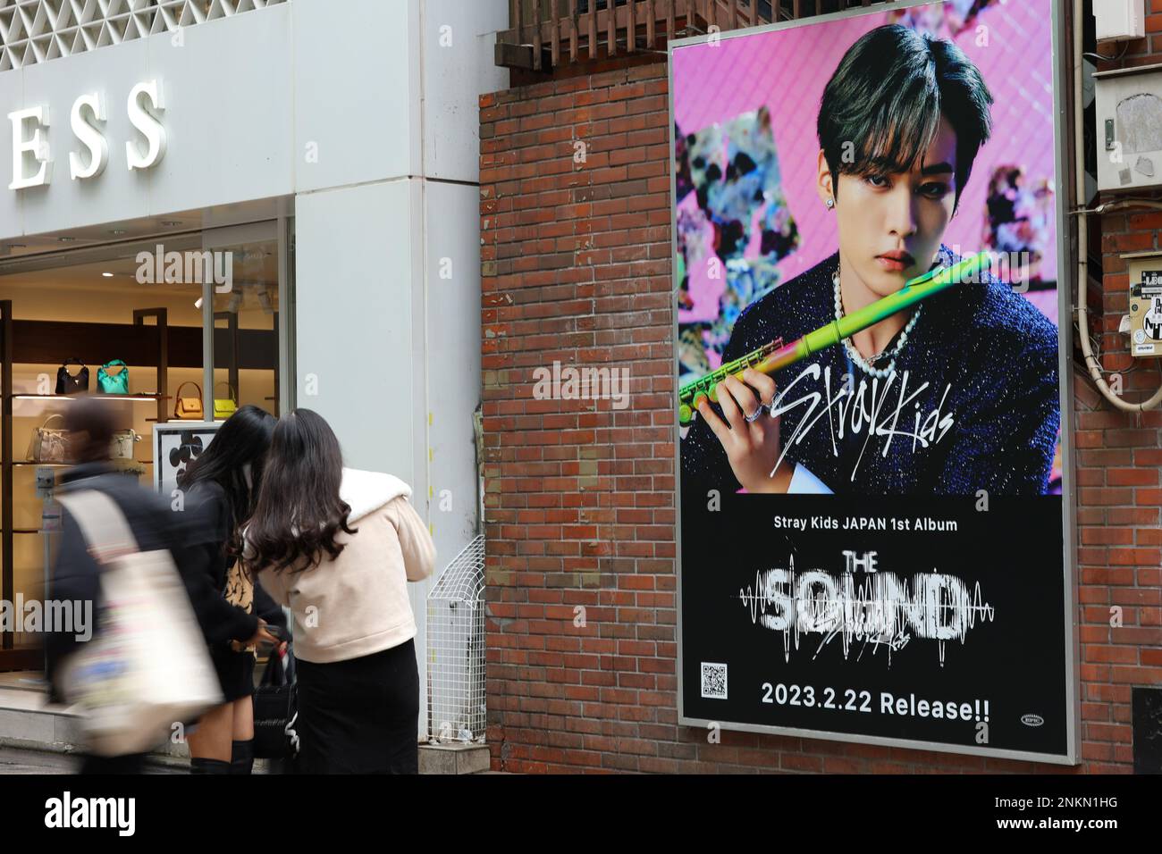 A billboard of South Korean boy band Stray Kids is seen at Shibuya ...