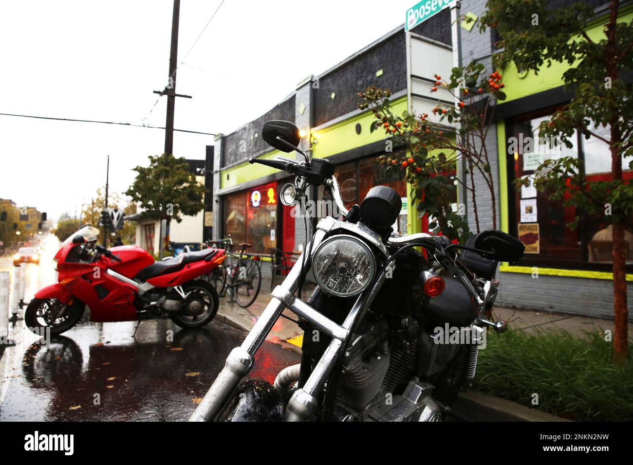 Motorcycles are parked in front of Cafe Racer on the restaurant's last ...