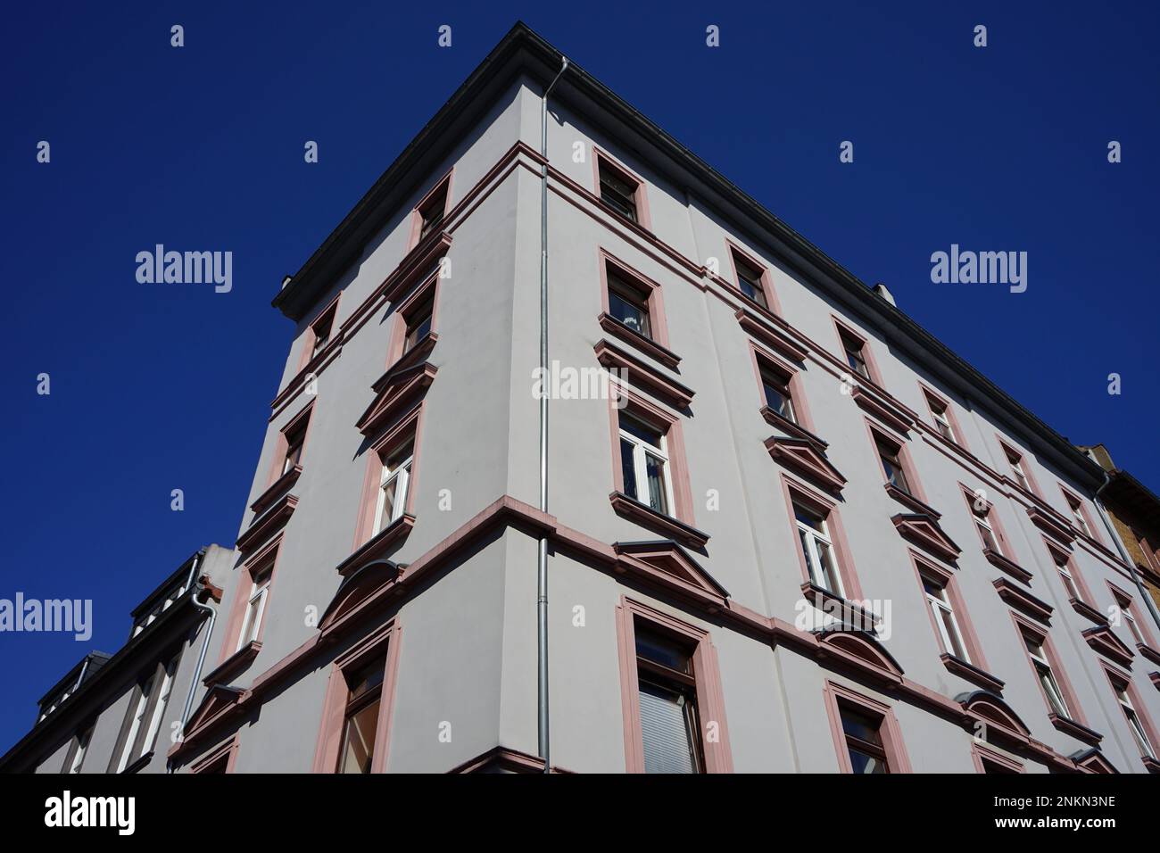 A high-rise architecture structure with multiple windows visible along ...