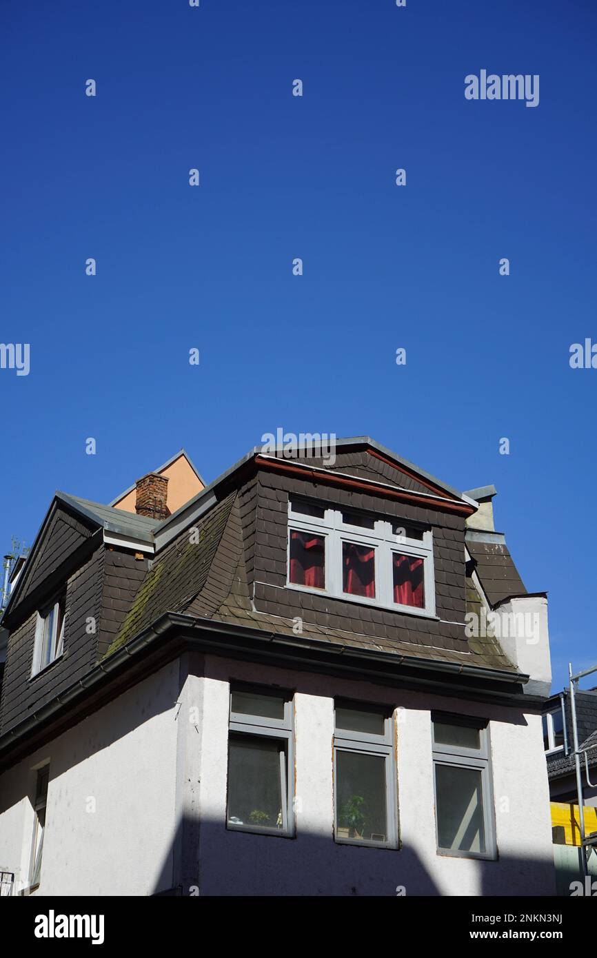 A grand, classical-style building with an ornate clock tower visible on ...