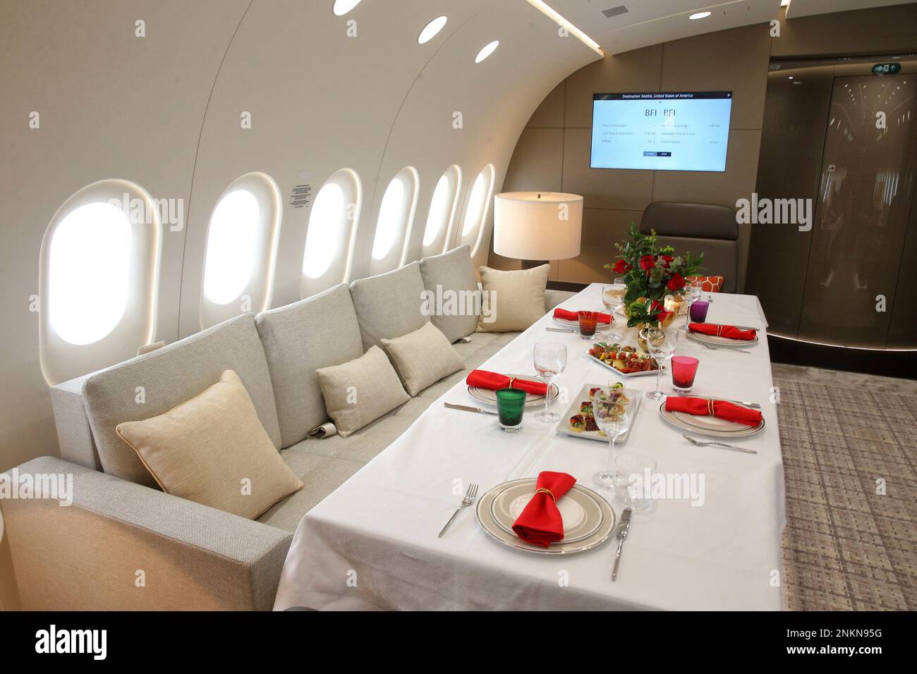 An open dining and lounge area is featured aboard the 2,400 square foot ...