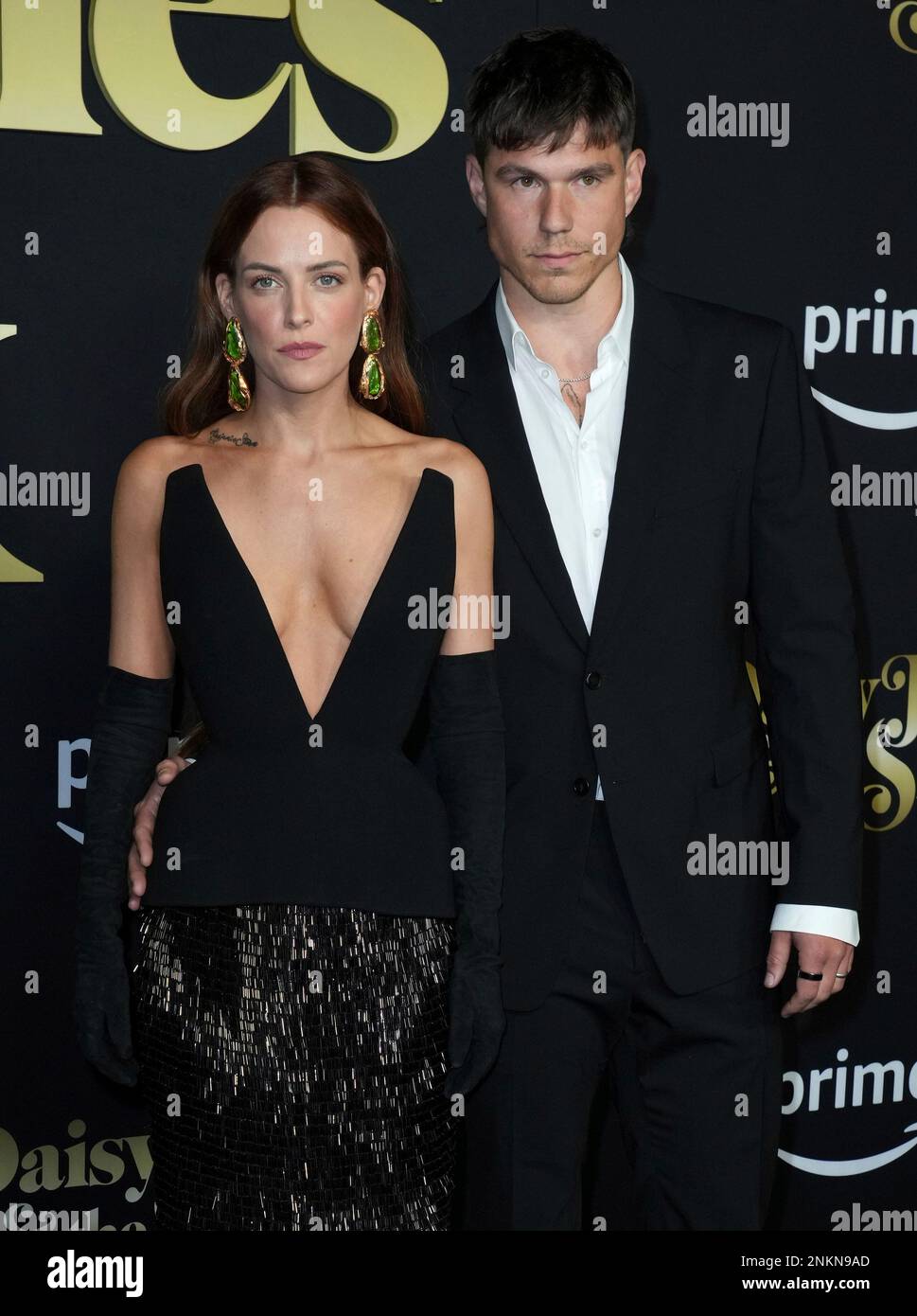 Riley Keough, left, and Ben Smith-Petersen arrive at the premiere of ...
