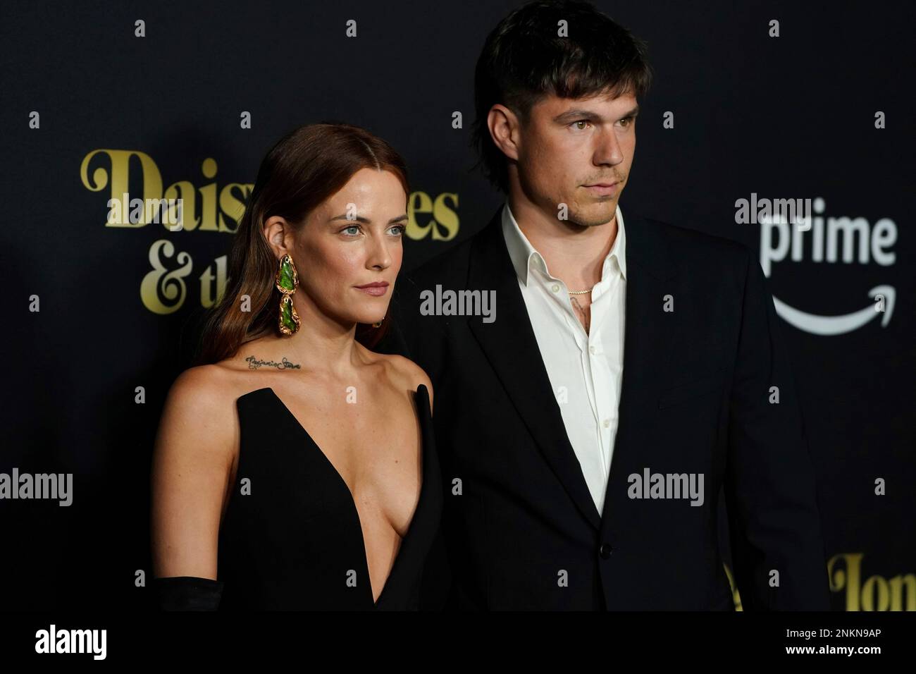 Riley Keough, left, and Ben Smith-Petersen arrive at the premiere of ...