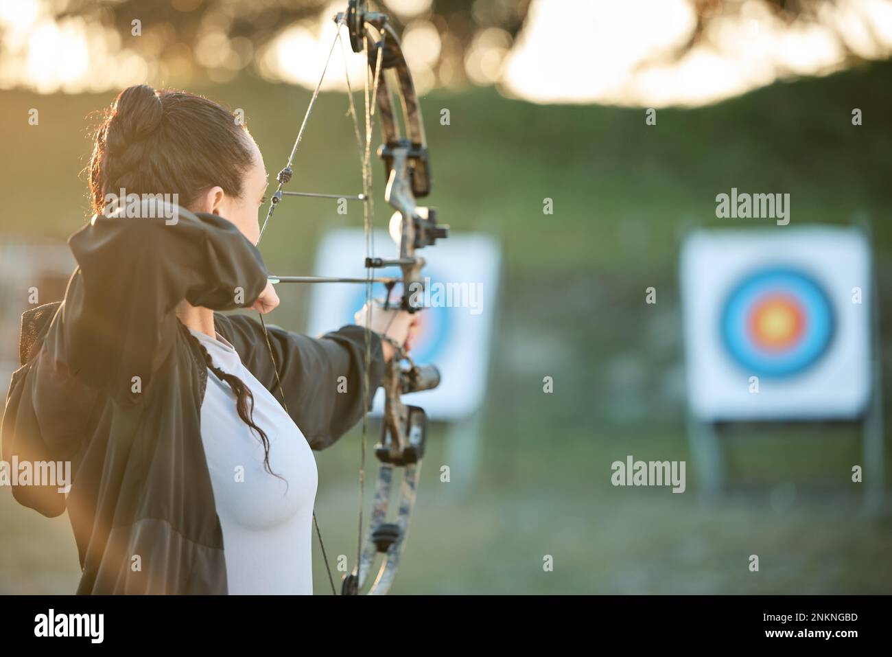 Sports archer, target and bow and arrow training for archery ...