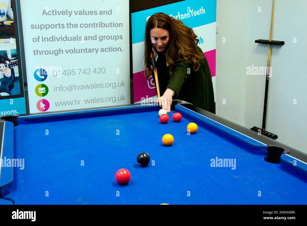 Britain's Kate, Duchess of Cambridge plays pool at the Neon Youth Club ...
