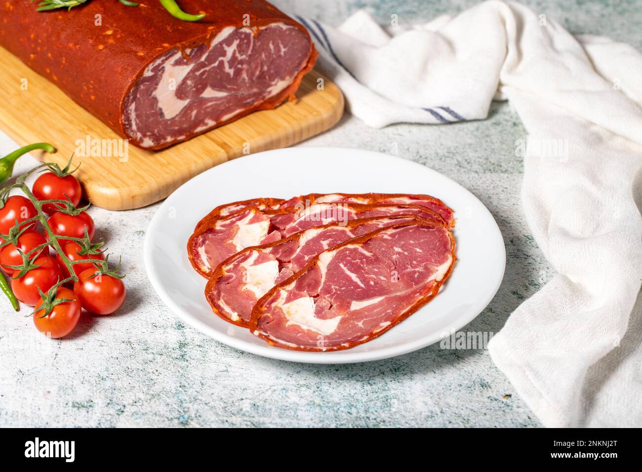 Beef ribeye bacon. Dried Turkish pastrami slices in plate. Traditional ...