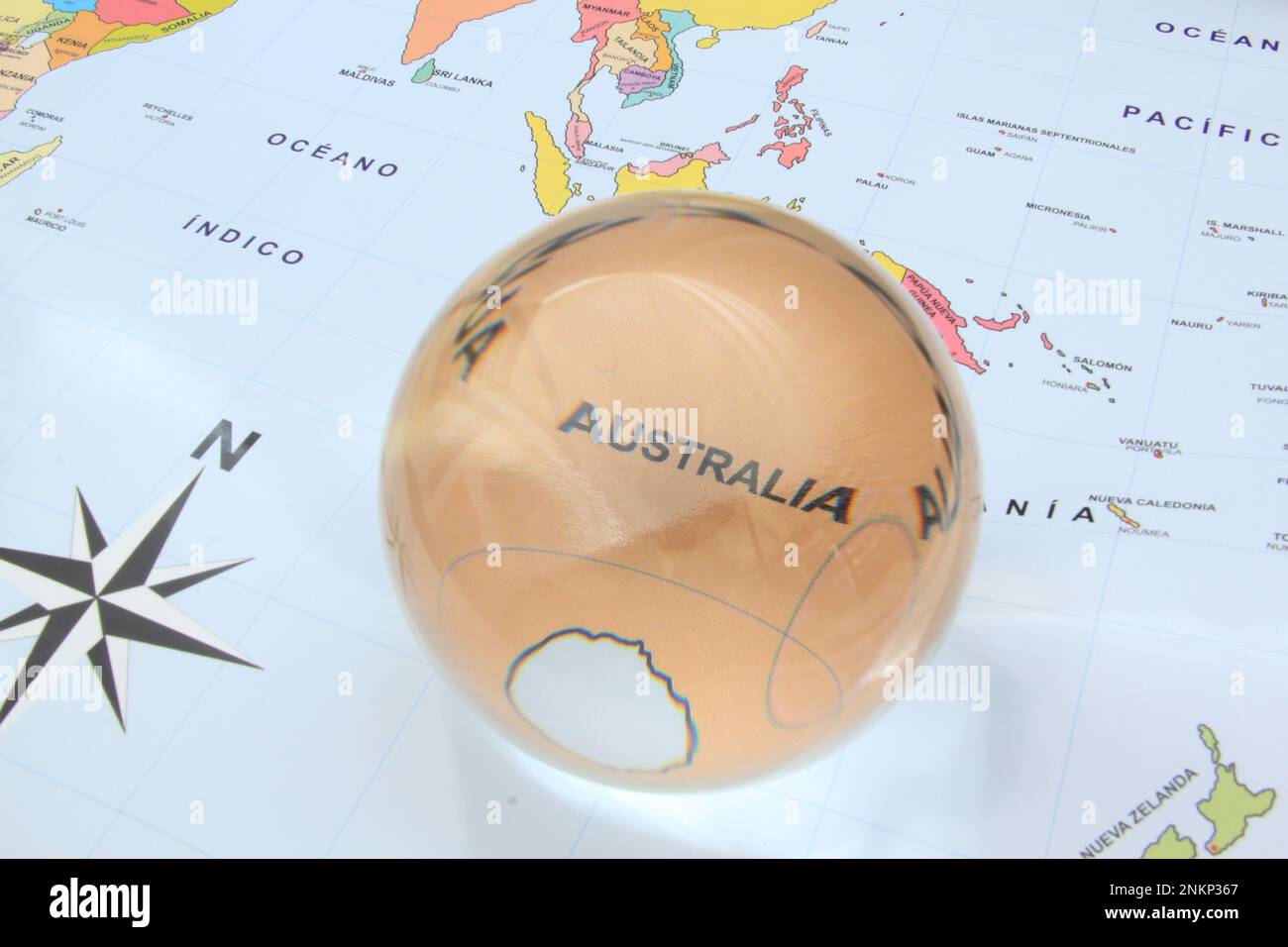 Crystal ball on a world map that highlights a country to highlight it ...