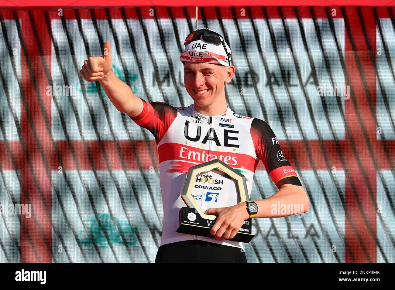 Slovenia's Tadej Pogacar of UAE team Emirates celebrates on the podium ...