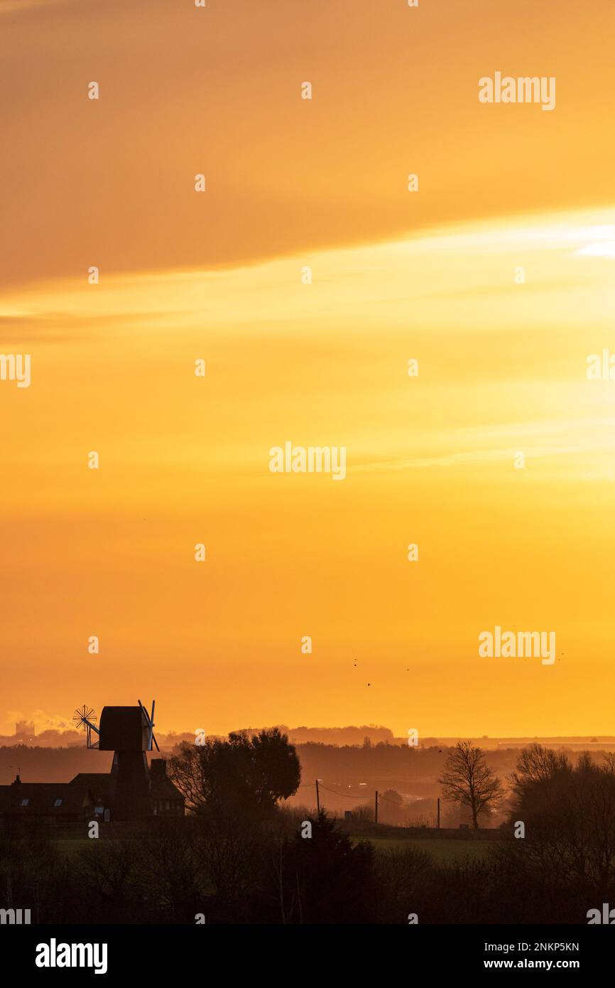 Orange dawn sky over the Kent landscape at Chislet in the winter ...