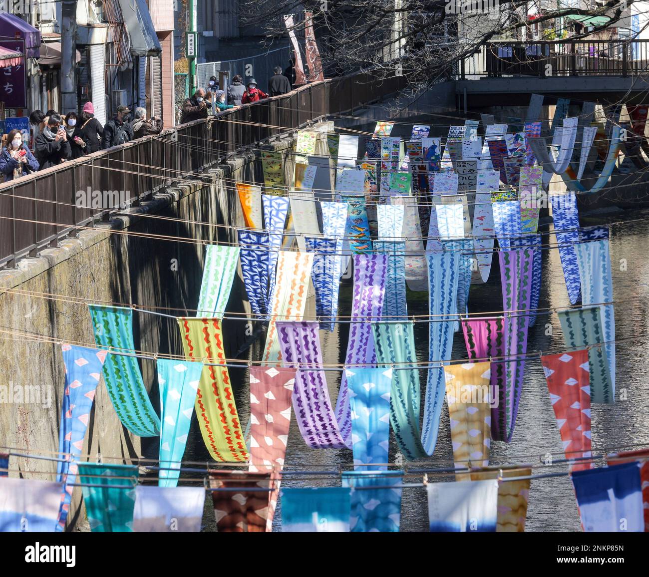 Colorful tan mono, kimono fabric cloth are hung on the Myoshouji River ...