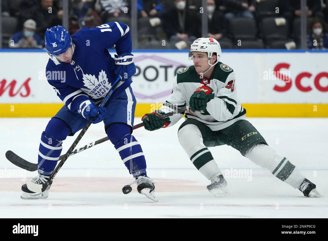Toronto Maple Leafs right wing Mitchell Marner (16) tries to control ...