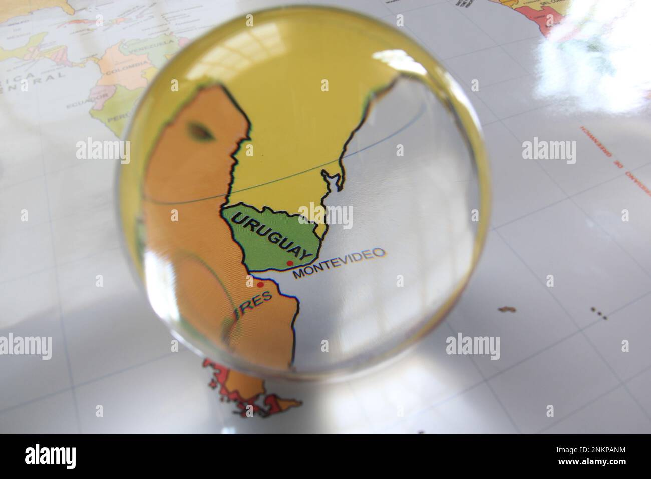 Crystal ball on a world map that highlights a country to highlight it ...