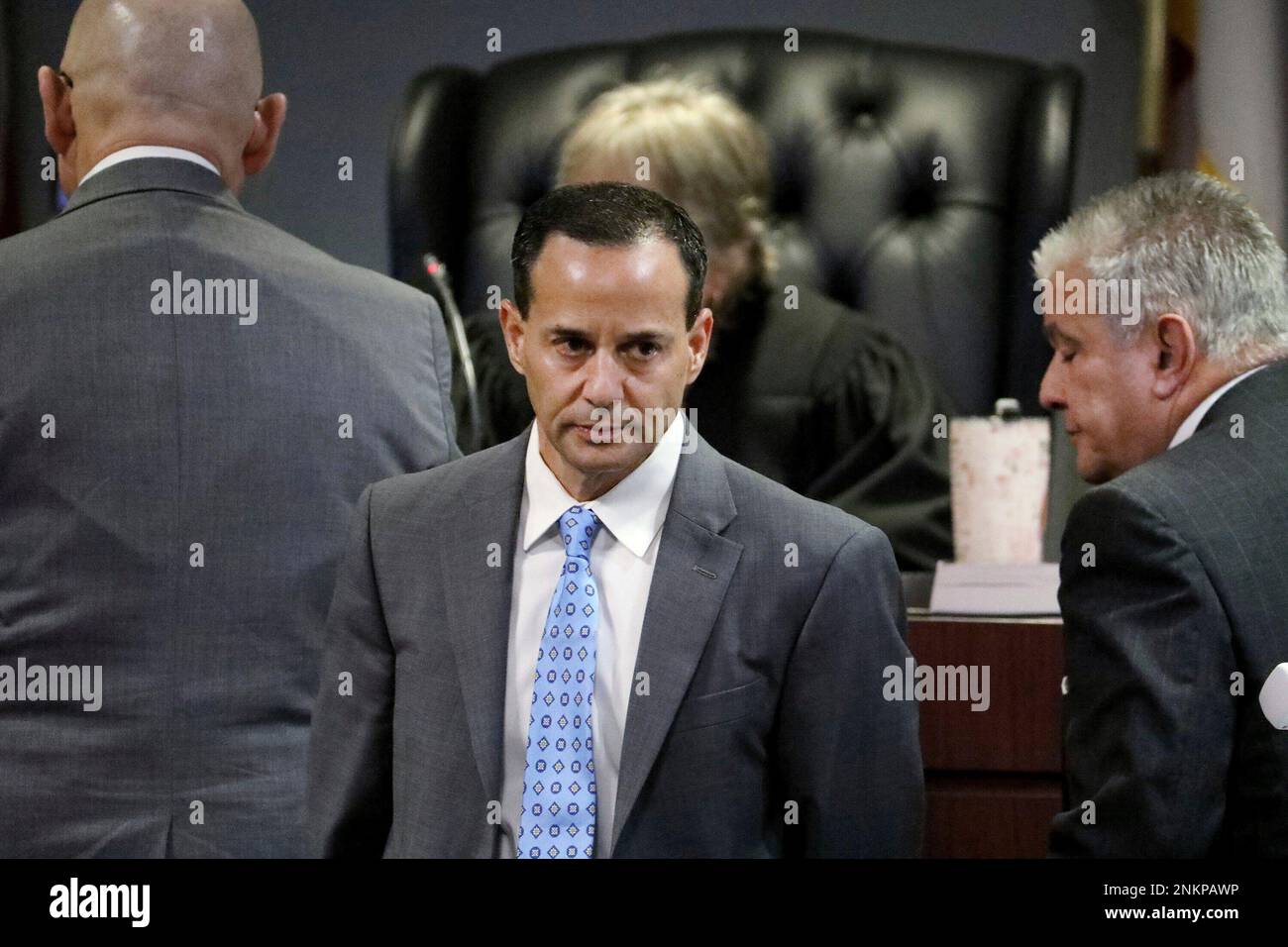 Pinellas-Pasco assistant state attorneys Scott Rosenwasser, center ...