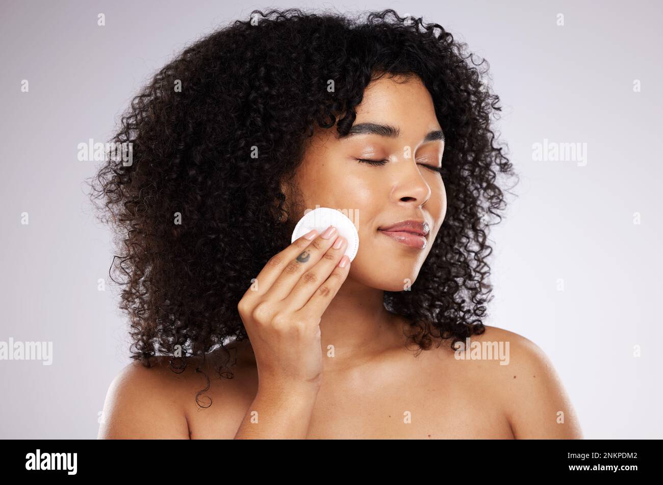 Beauty, cotton swab and face of black woman for wellness, skincare ...