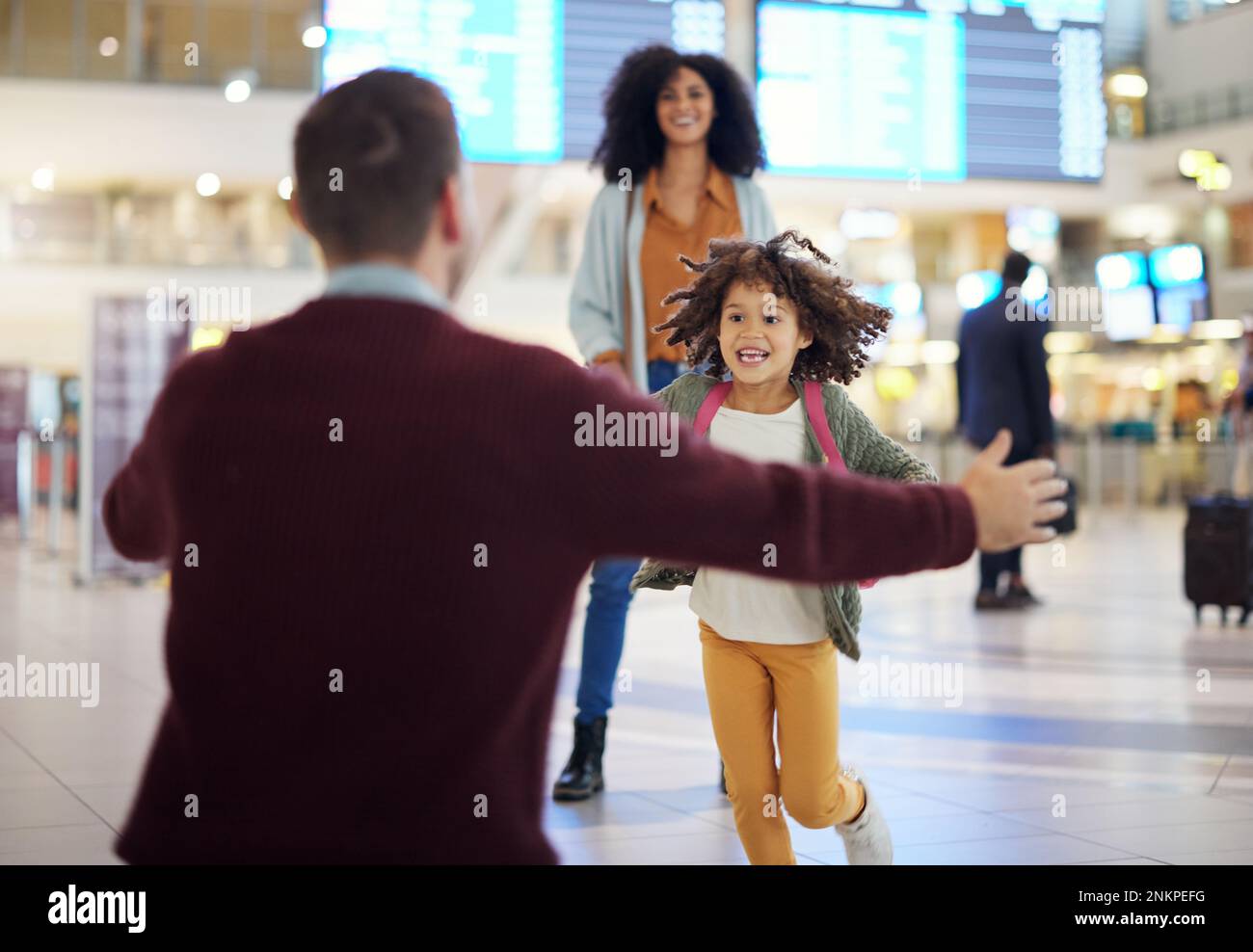 Happy child running to father at airport for welcome home travel and ...