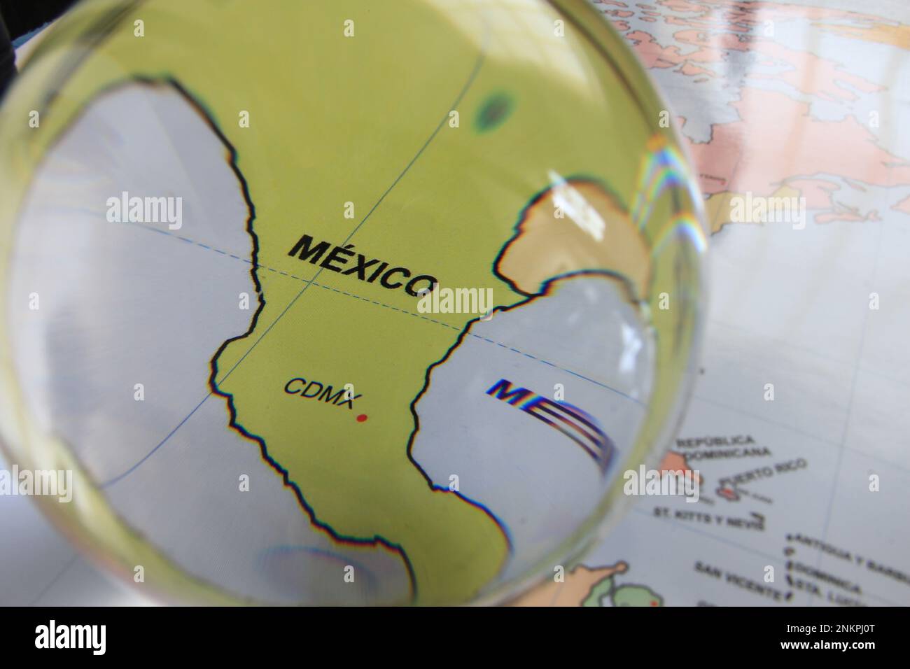 Crystal ball on a world map that highlights a country to highlight it ...