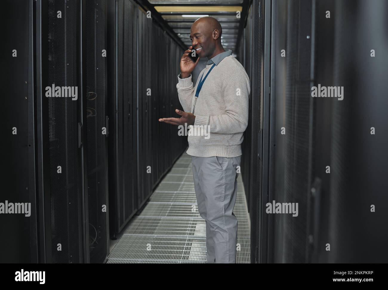 Server room, phone call and man for system update, technician power or ...