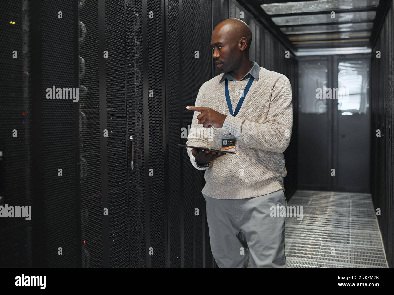 Tablet Network Management And It Black Man For Software Update Working On Code In Dark Server