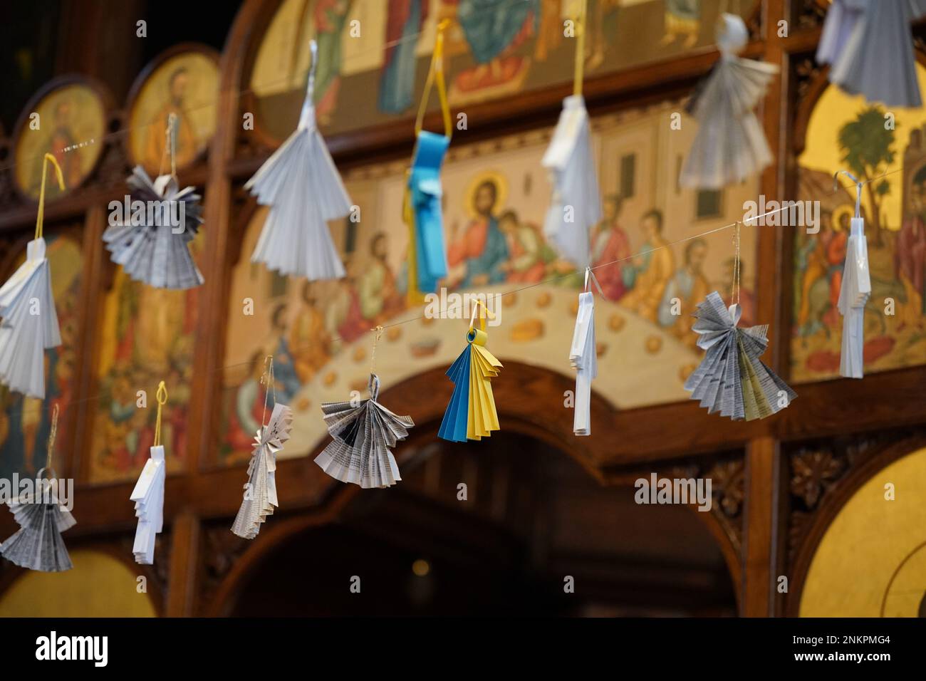 461 paper angels hang from the roof of the cathedral, one for each ...