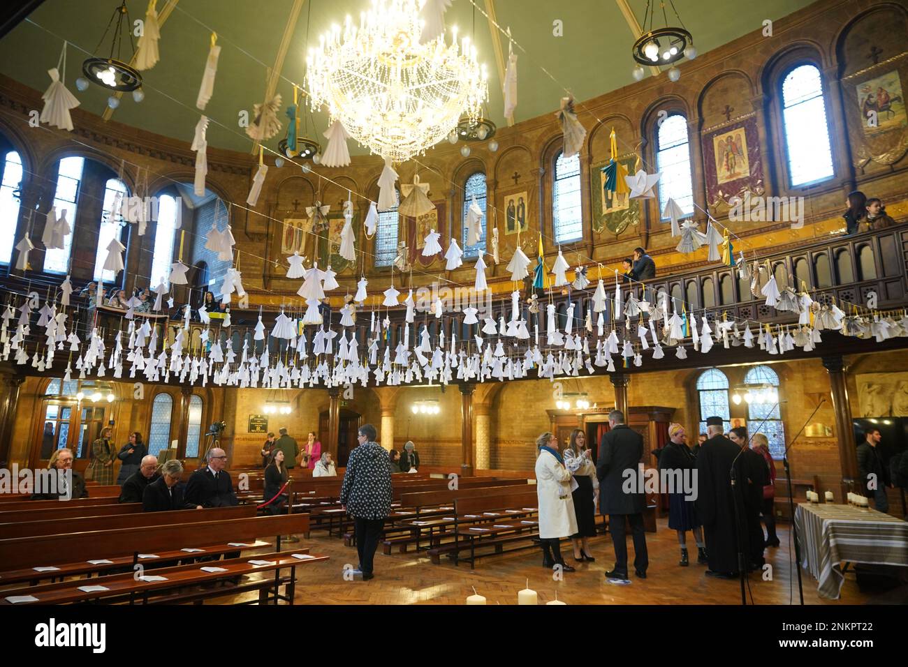 461 paper angels hang from the roof of the cathedral, one for each ...