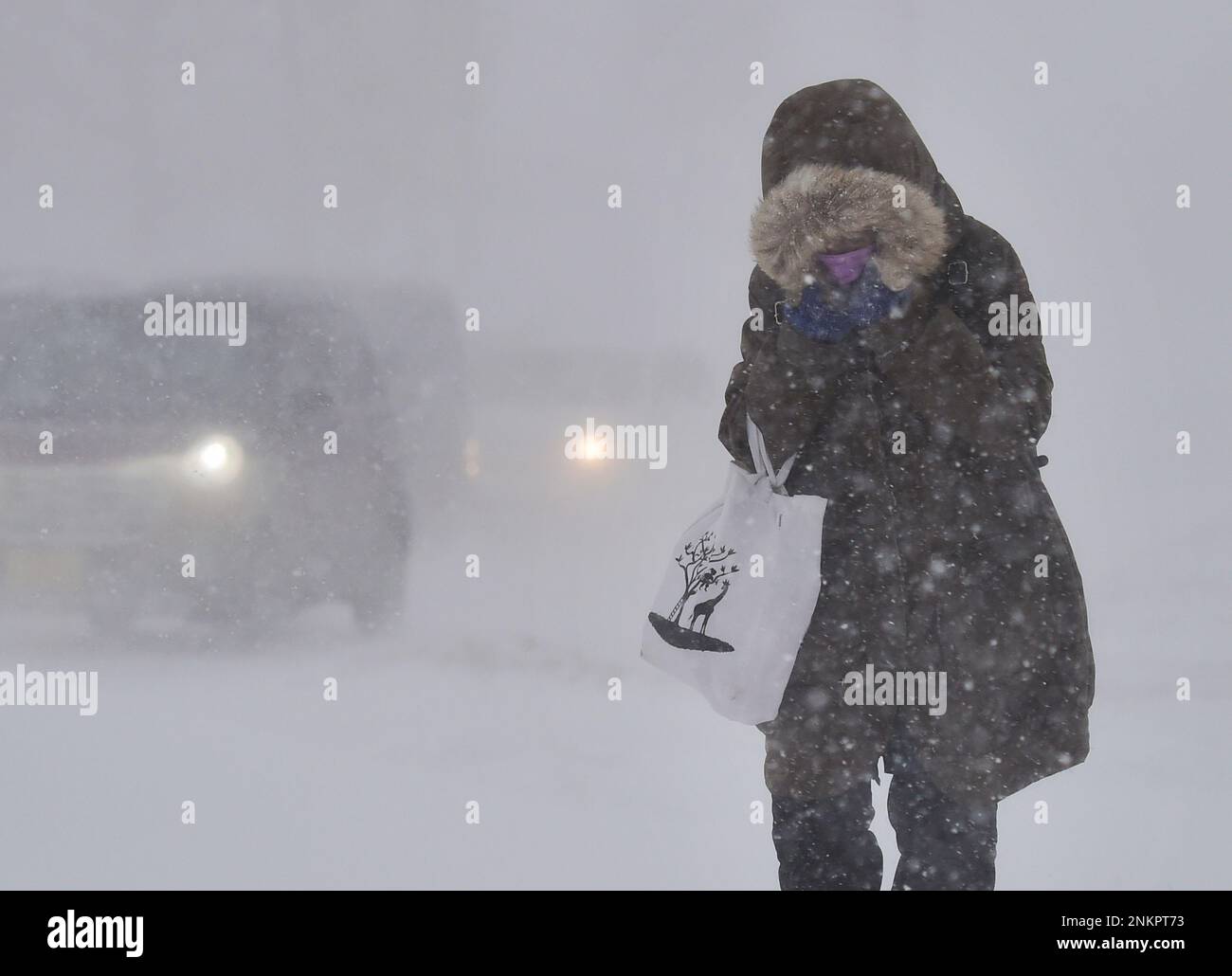 People walk through blizzard of snow in Sapporo City, Hokkaido ...