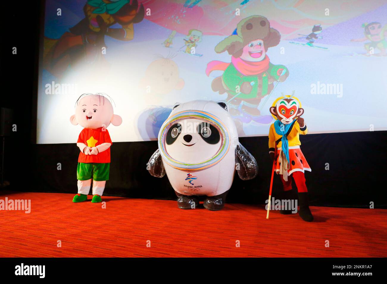 Bing Dwen Dwen, center, the mascot of the 2022 Beijing Winter Olympics, shows up with two other ...