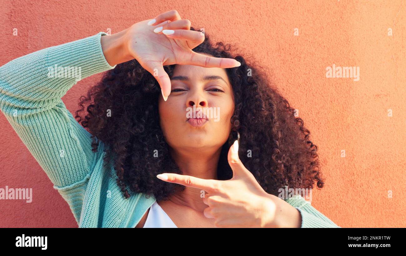Happy black model, funny frame face on wall background and portrait ...