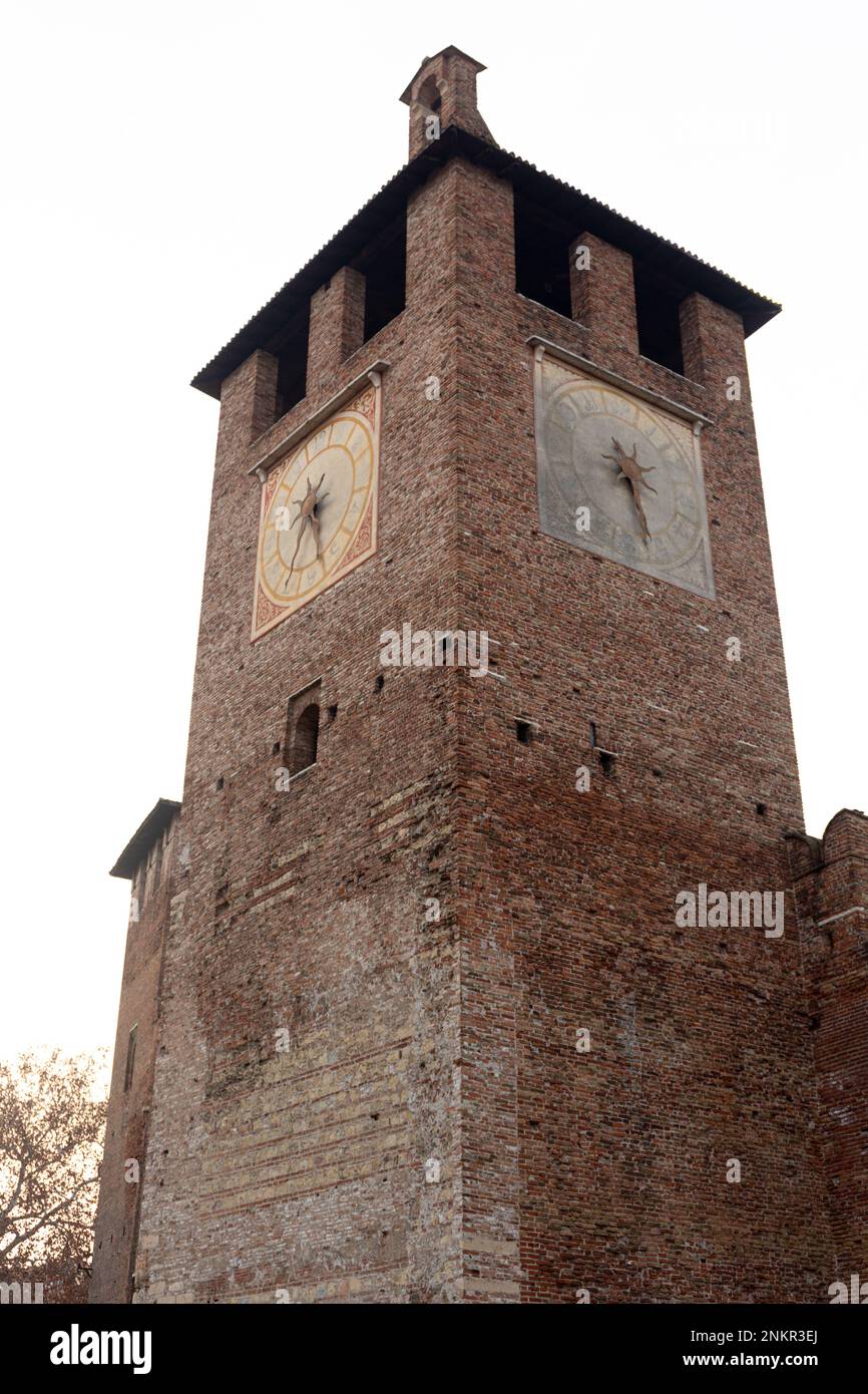 Full view of a Castelvecchio tower, Verona. Medieval brick architecture ...